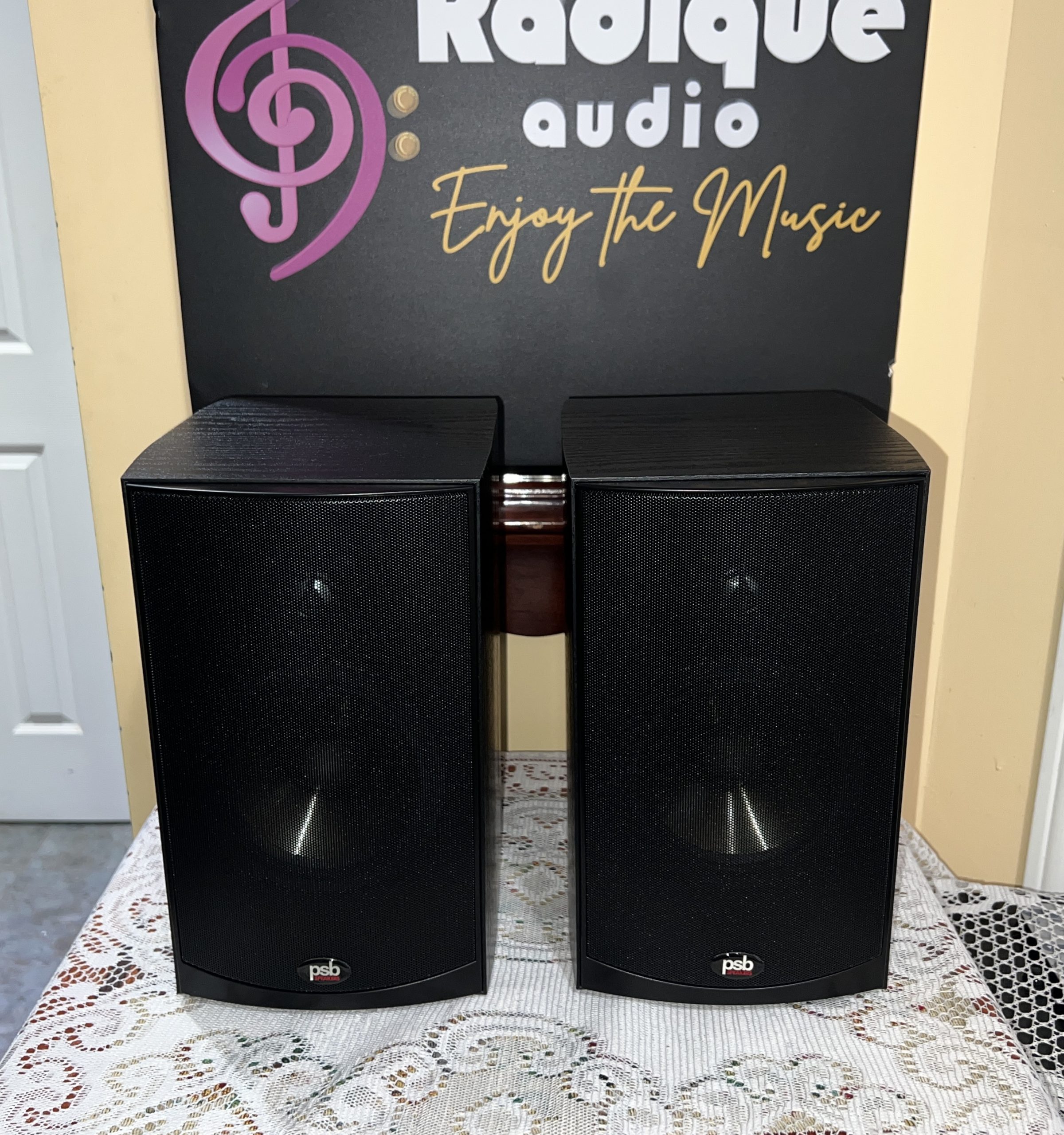 PSB Alpha B1 Bookshelf Speakers – Attractive Black Ash - Radique Inc